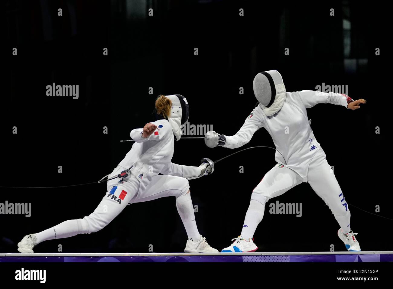 France's Auriane Mallo Breton, left, competes with Italy's Giulia Rizzi ...