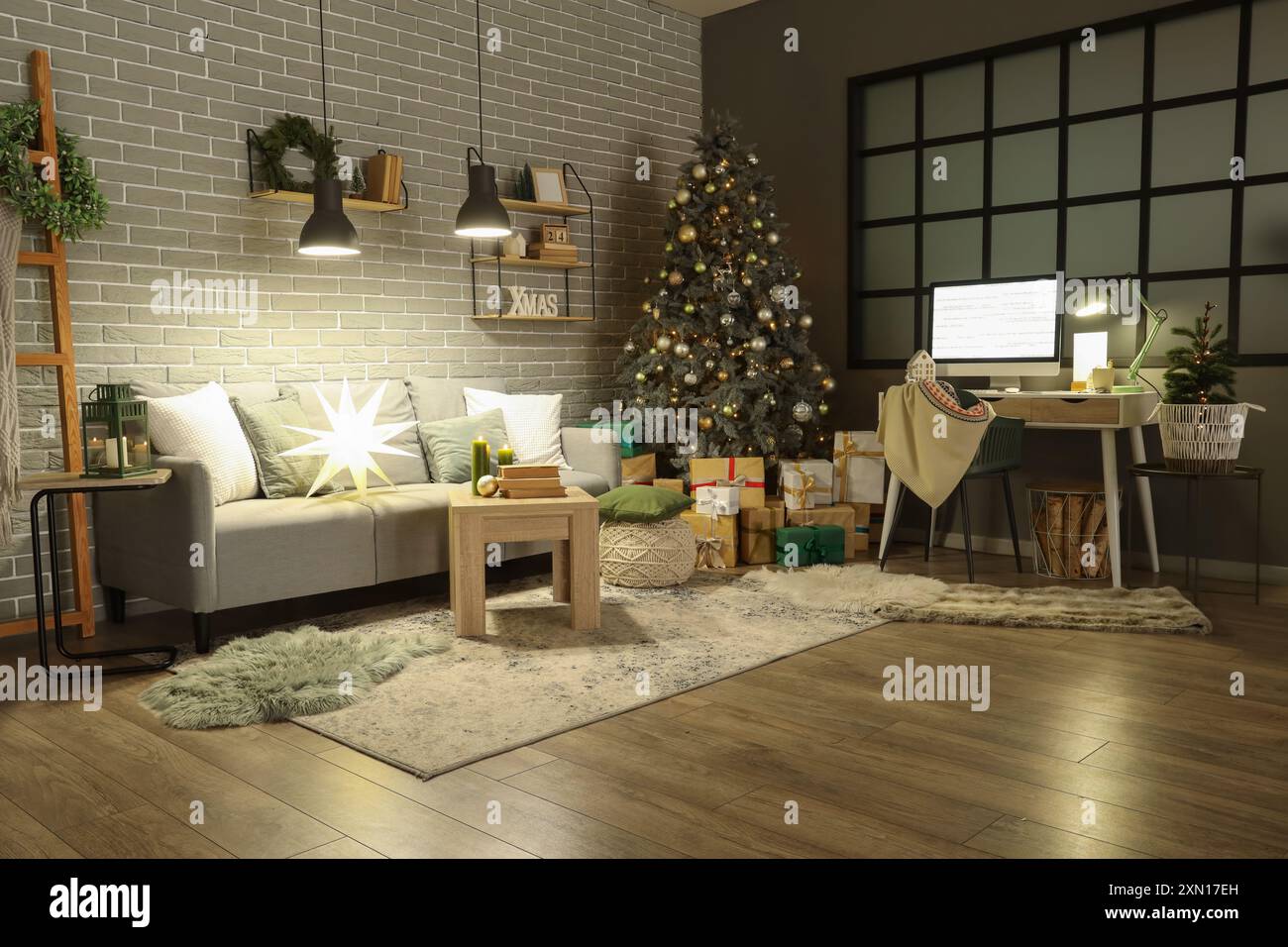 Interior of dark programmer's office with workplace, Christmas tree and ...