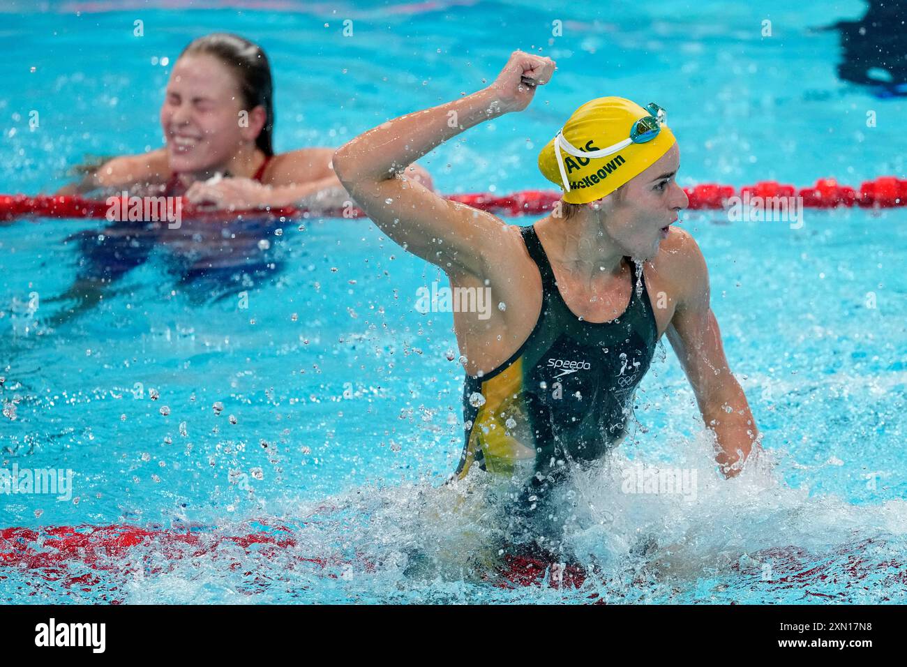 Kaylee McKeown, of Australia, celebrates after winning the women's 100 ...