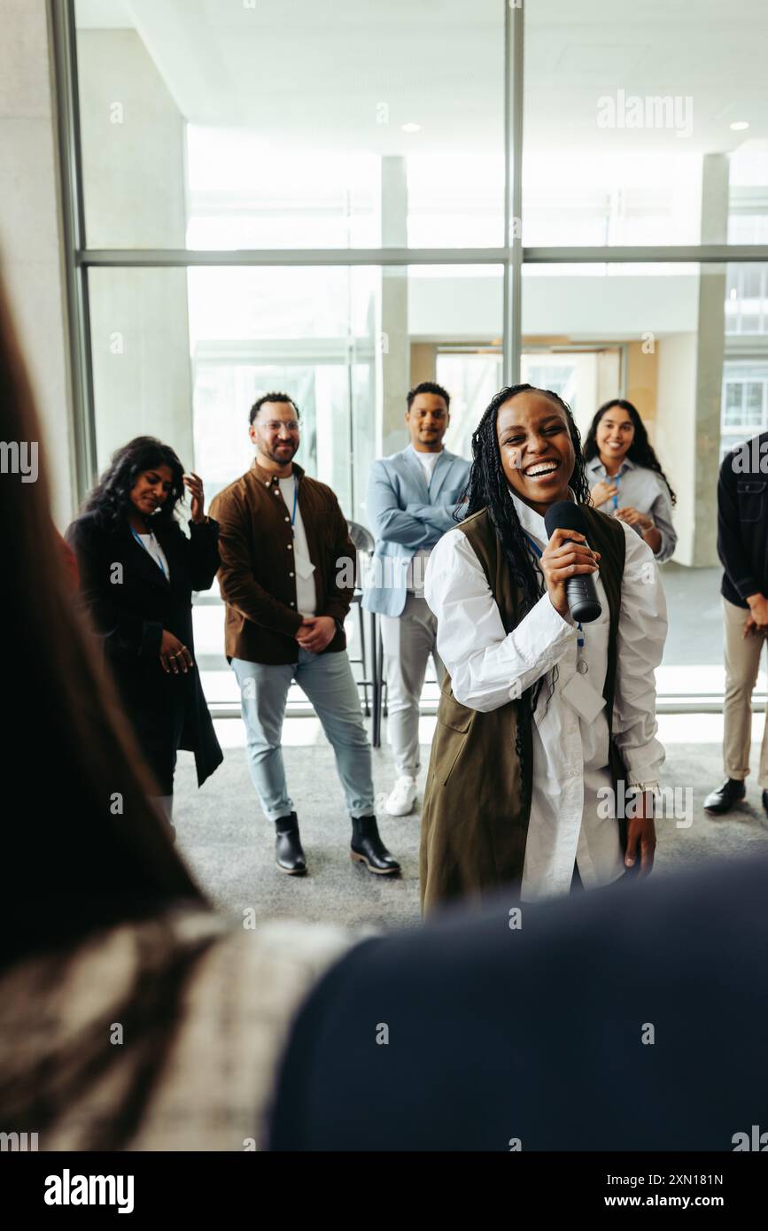 Successful leader inspiring workforce during a motivational business ...