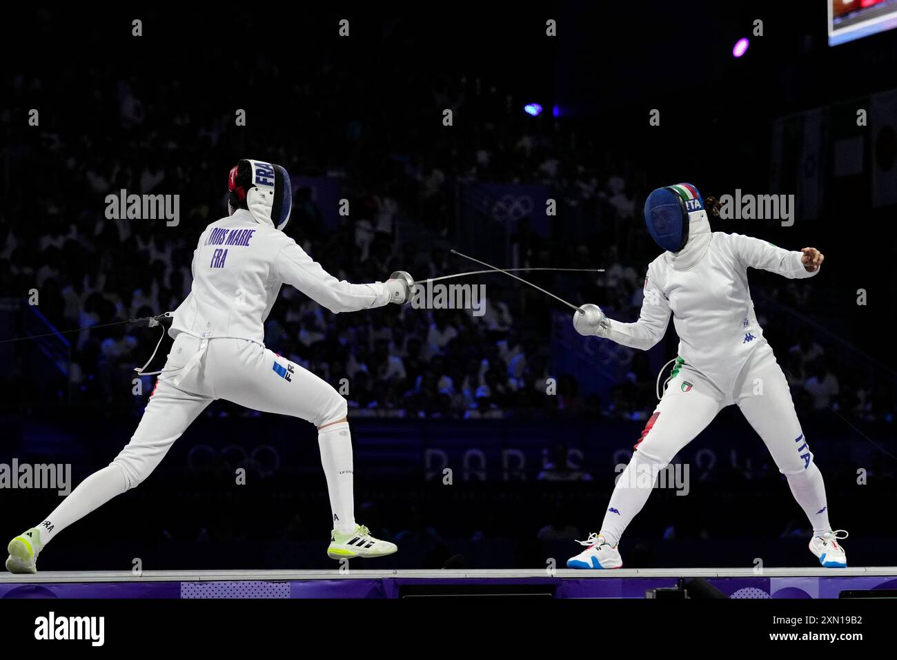 France's Alexsandra Louis Marie, left, competes with Italy's Mara ...
