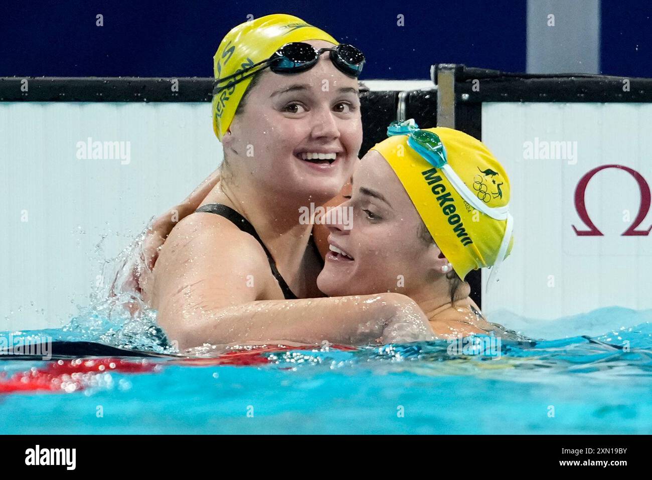 Kaylee McKeown, right, of Australia, is congratulated by teammate Iona ...