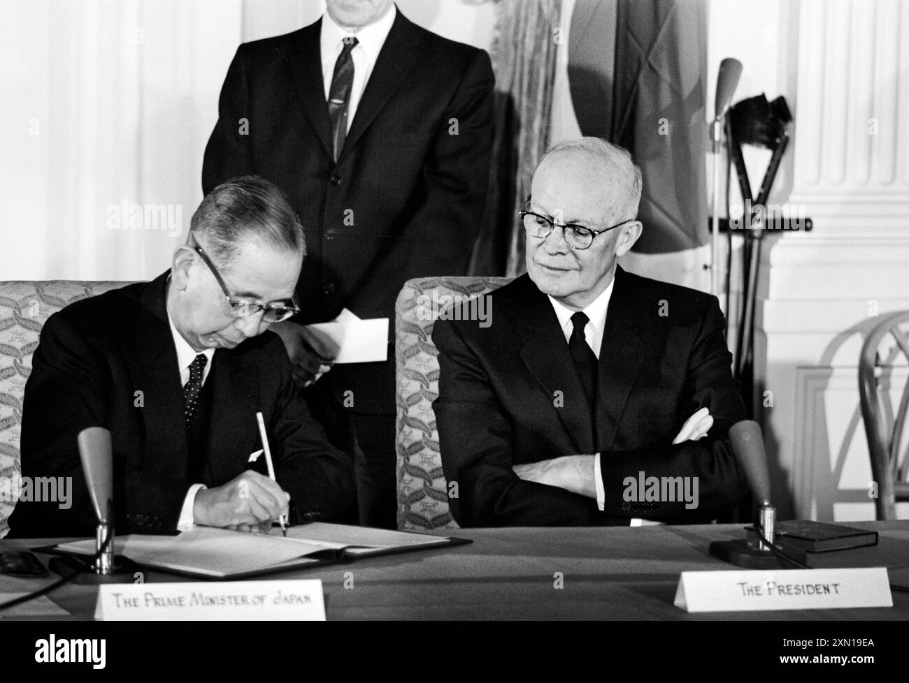 Prime Minister Nobusuke Kishi of Japan signing Mutual Cooperation and ...