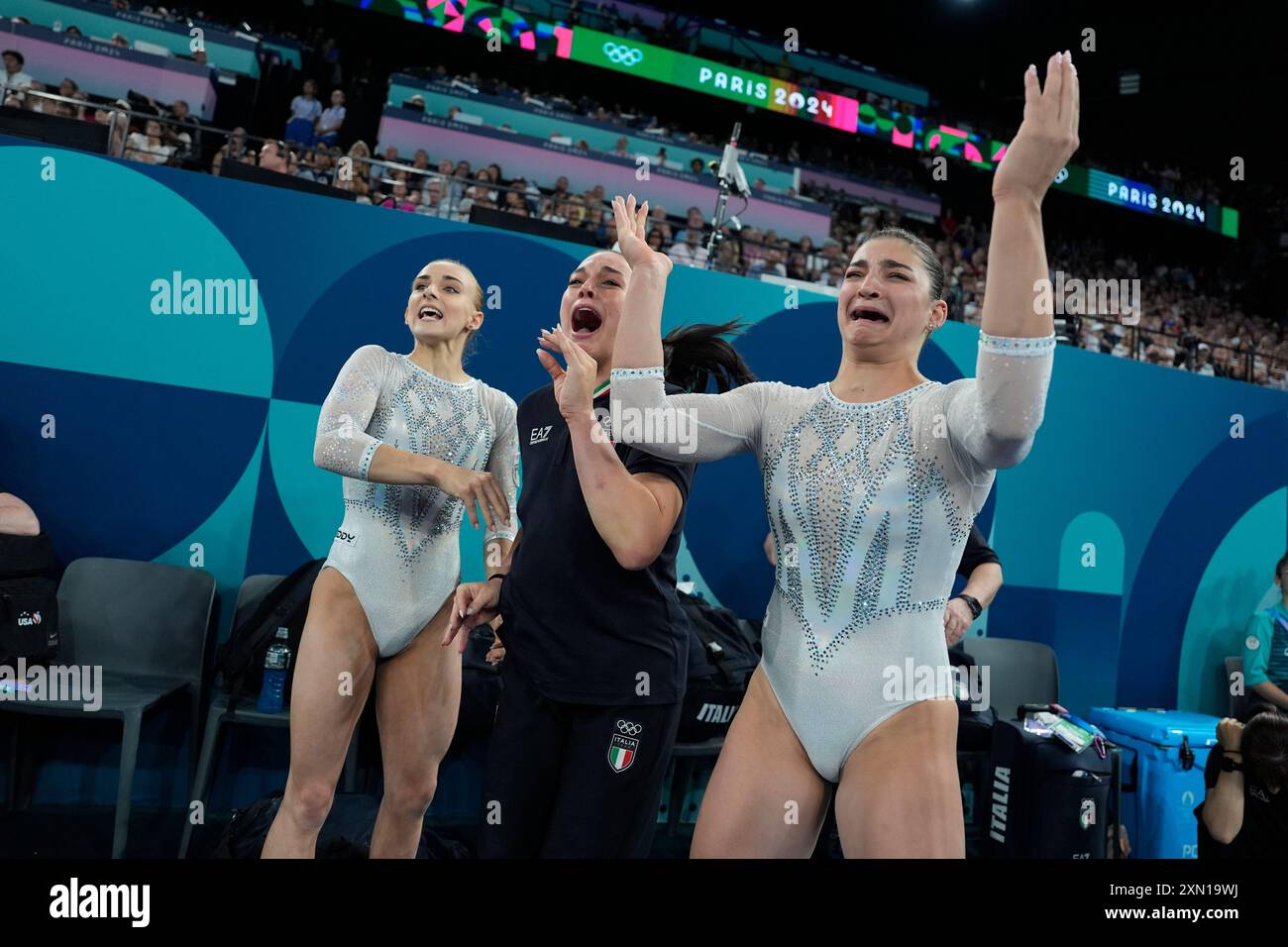 Members of Team Italy celebrate after winning the silver medal during ...