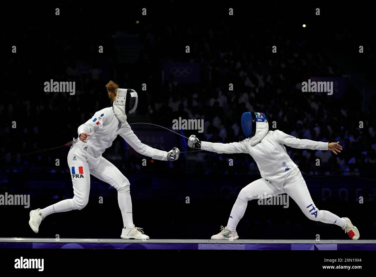 France's Auriane Mallo Breton, left, competes with Italy's Alberta ...
