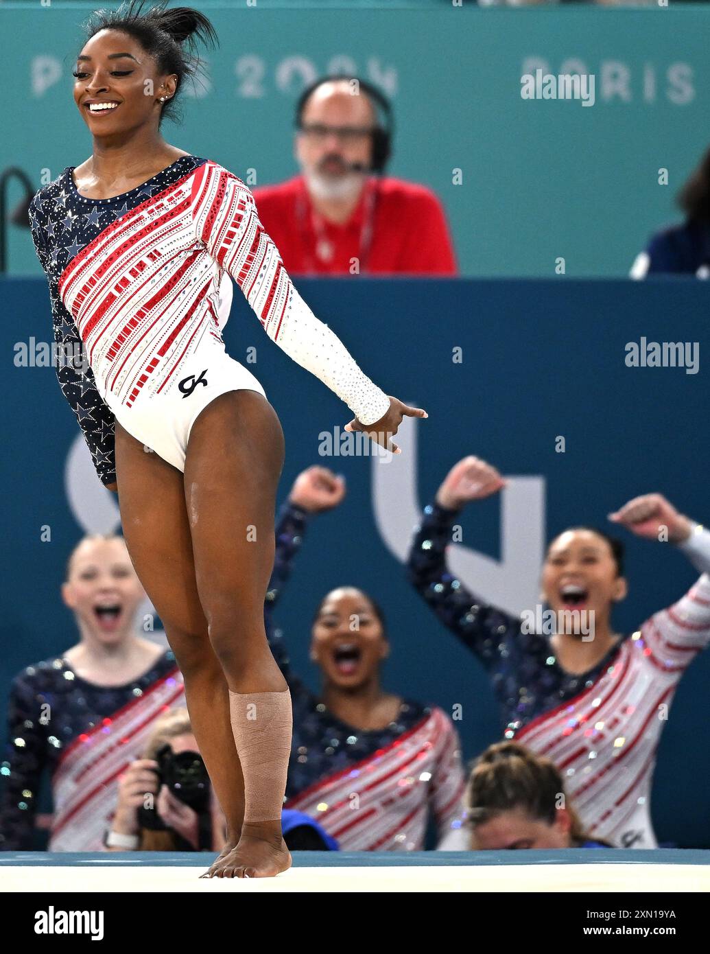 Paris, France. 30th July, 2024. Teammates cheer as Simone Biles of the ...