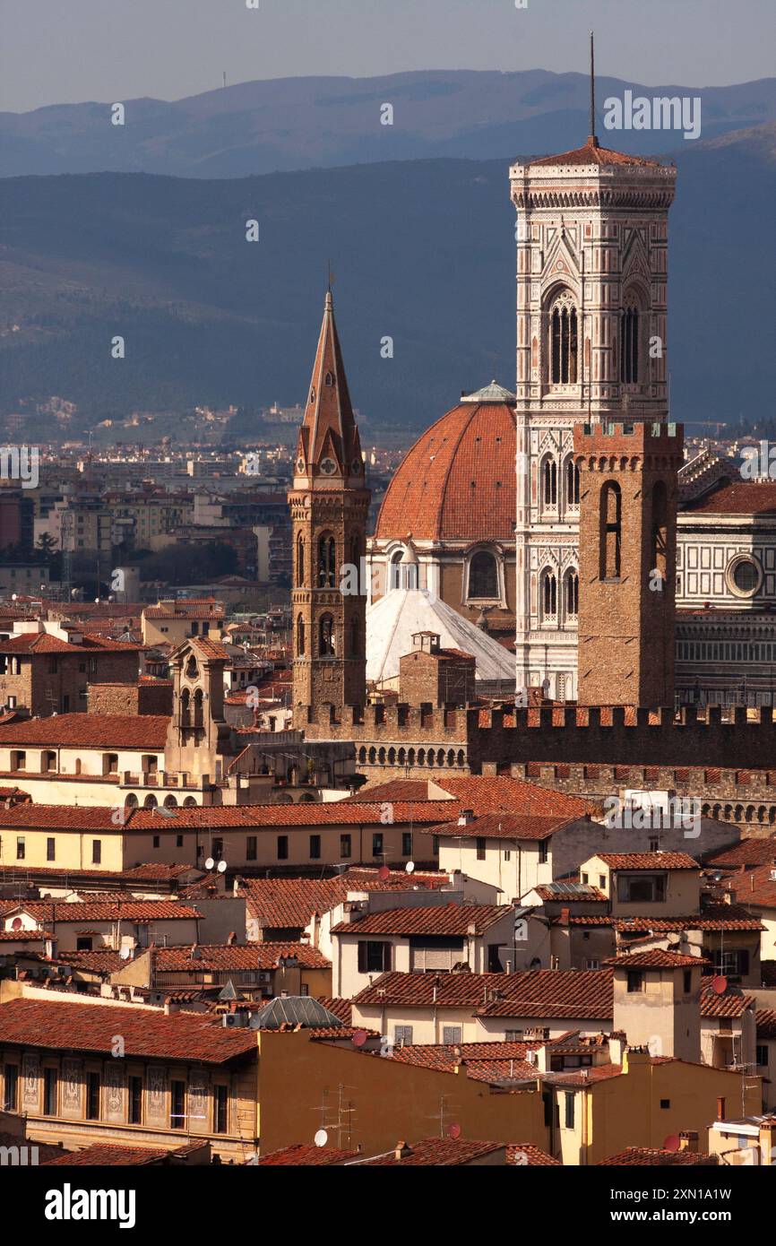 View of Giottos campanile across the rroftops of Florence in Italy in ...