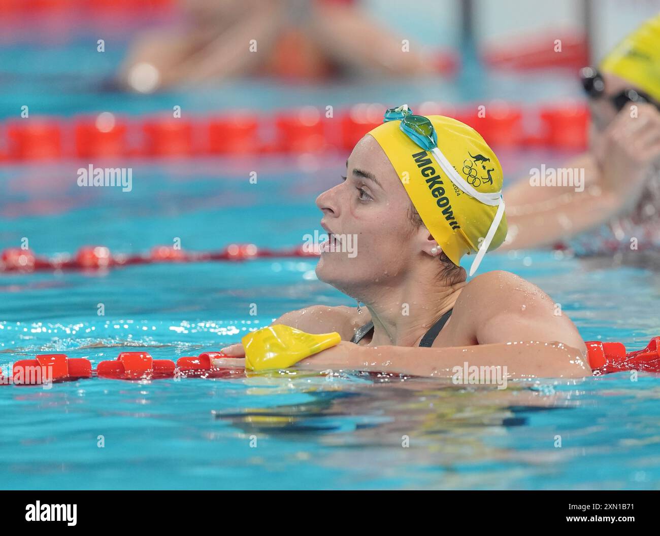 Australia's McKEOWN Kaylee reacts after winning the women's swimming 100m backstroke final in ...