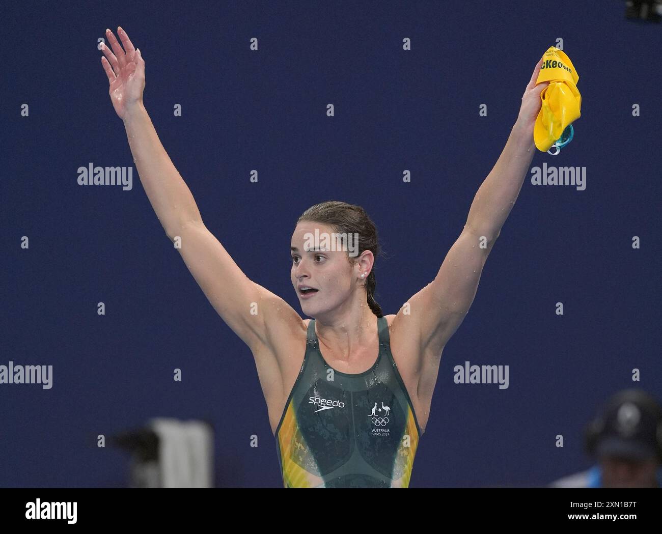 Australia's McKEOWN Kaylee reacts after winning the women's swimming 100m backstroke final in ...