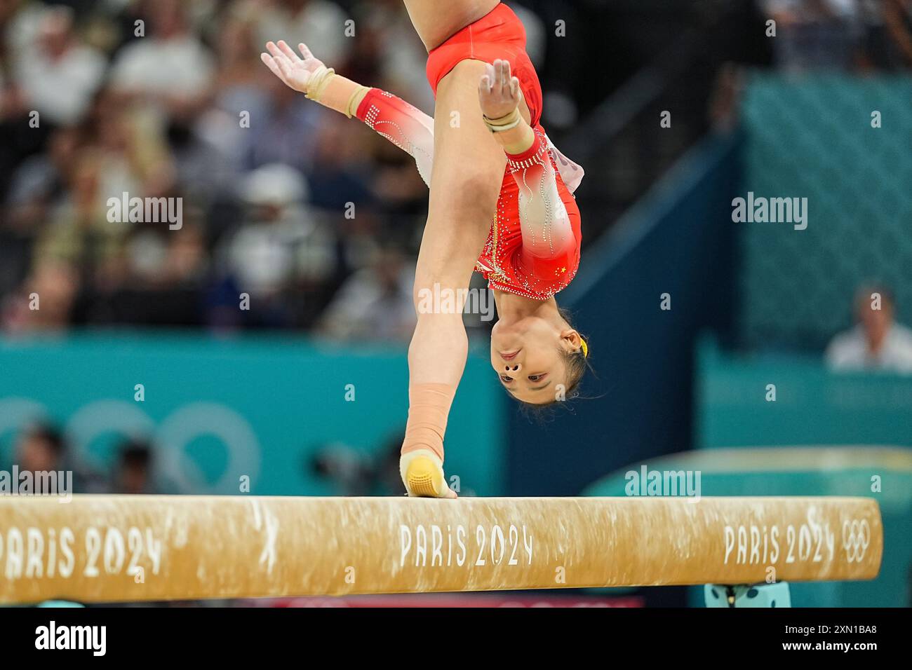 Huan Luo of China competes in the Balance Beam during Women's Team ...