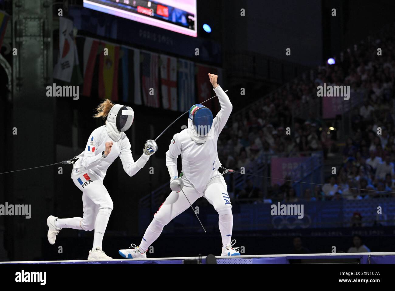 France's team members in action during the women's epee team final ...