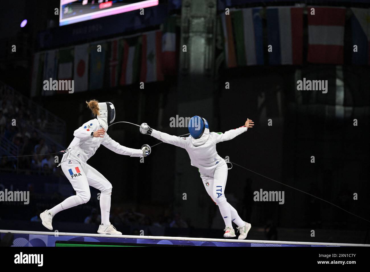 France's team members in action during the women's epee team final ...