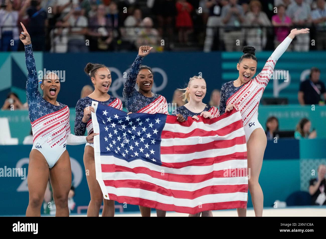 Members of Team USA celebrate after winning the gold medal in the women ...