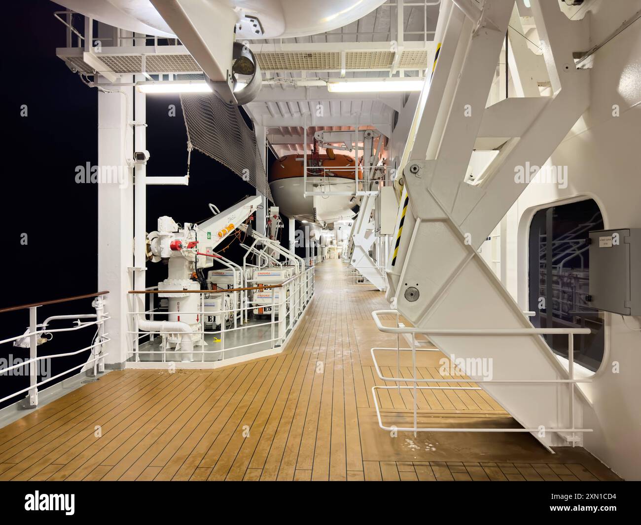 4 May 2024: Outer deck of a cruise ship at night, equipped with ...