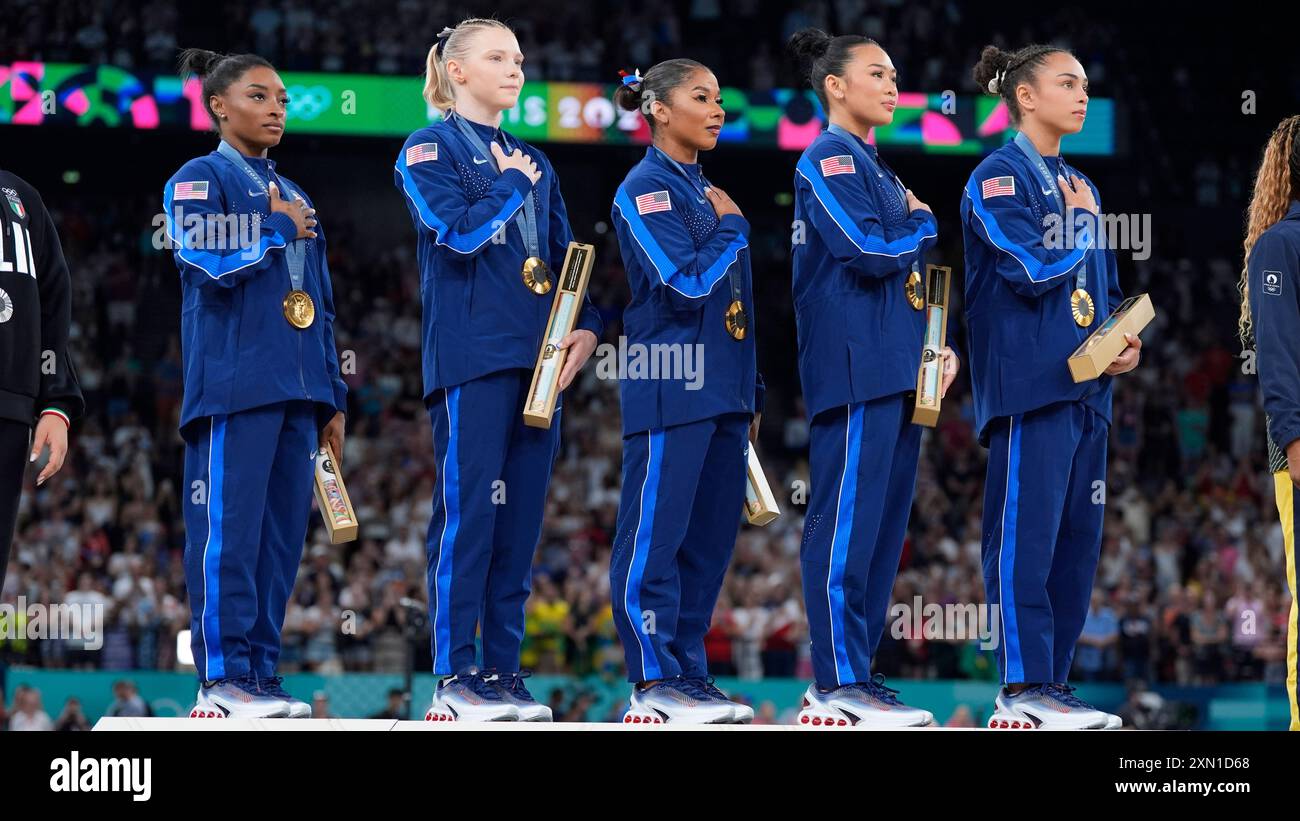 Team USA stand on the podium after winning the gold medal during the ...