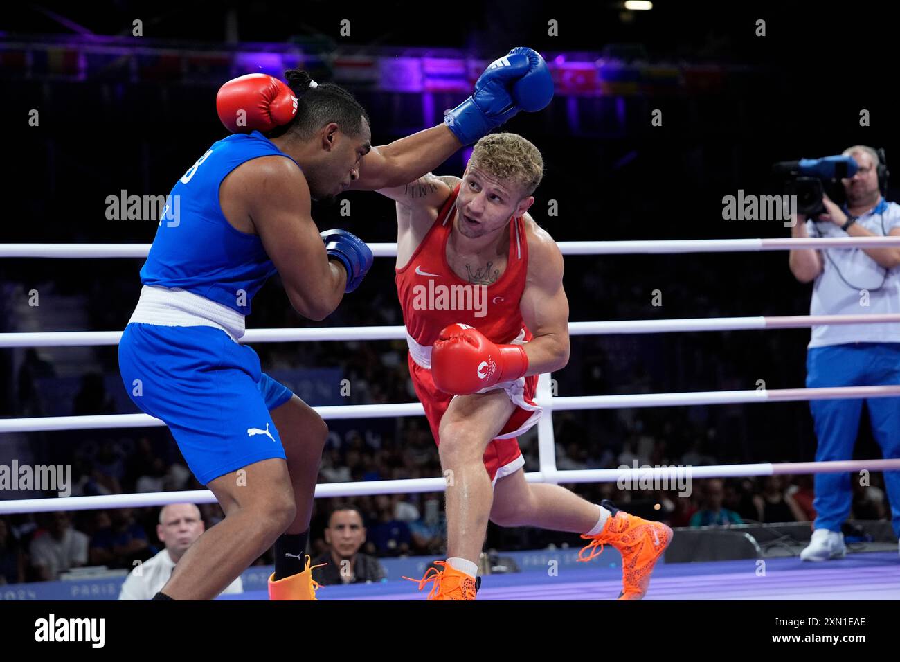 Turkey's Kaan Aykutsun, right, fights Cuba's Arlen Lopez in their ...