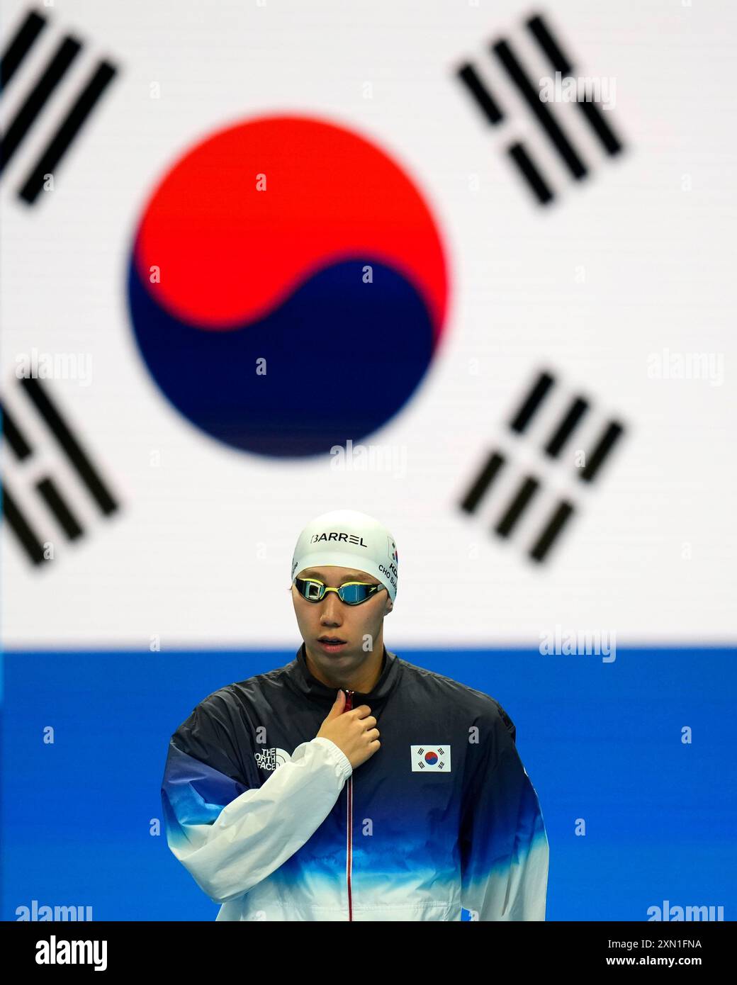 Sung Jae Cho, of South Korea, walks onto the pool deck for his men's ...