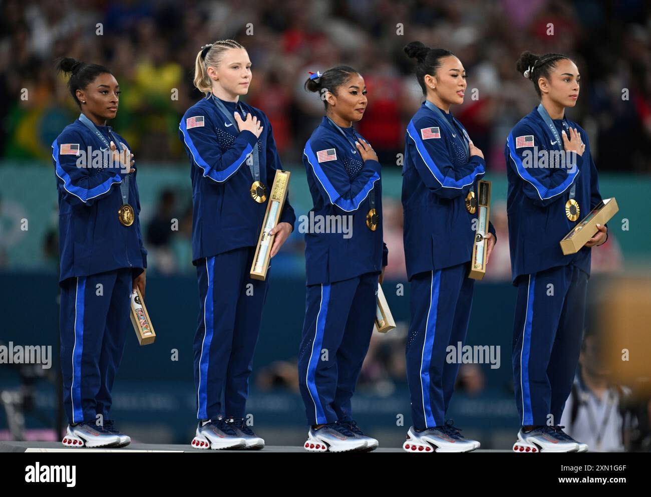 Members of (L-R) Italy of silver, the United States of gold, and Brazil ...