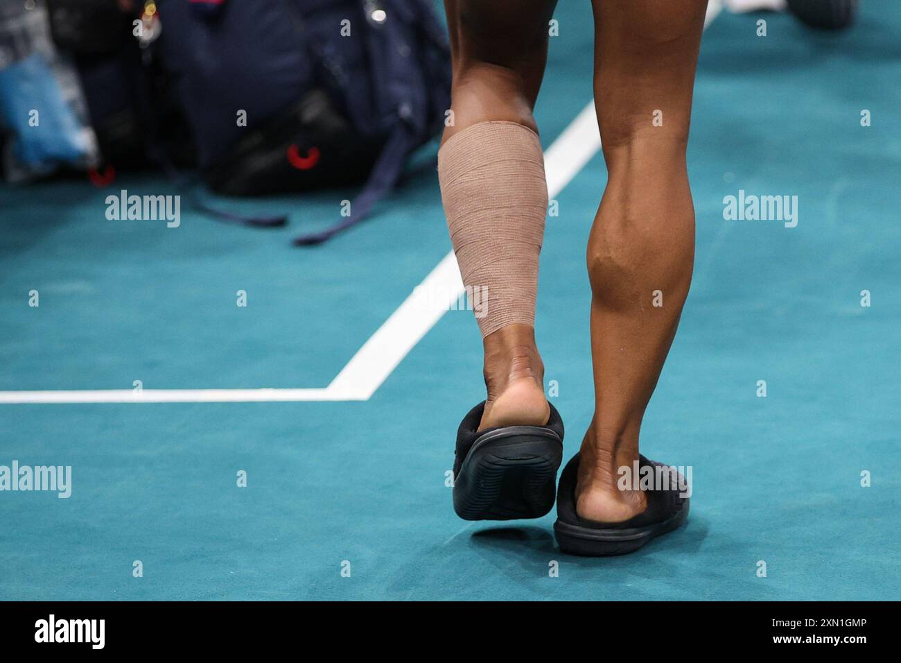 PARIS, FRANCE. 30th July, 2024. The bandaged left calf of Simone Biles ...