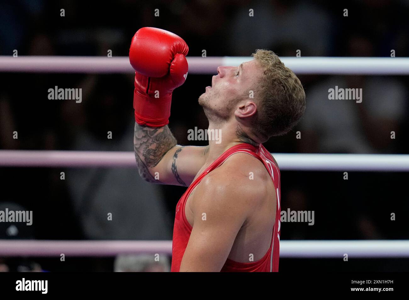 Turkey's Kaan Aykutsun, gestures after he was defeated by Cuba's Arlen ...