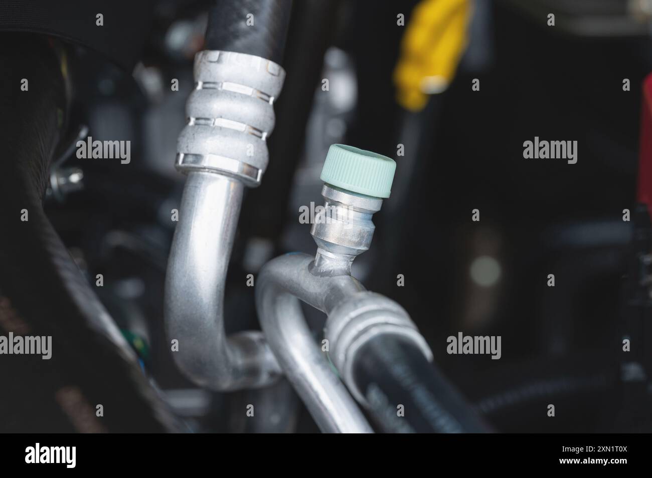Metal pipe connection with rubber tube close up view Stock Photo - Alamy