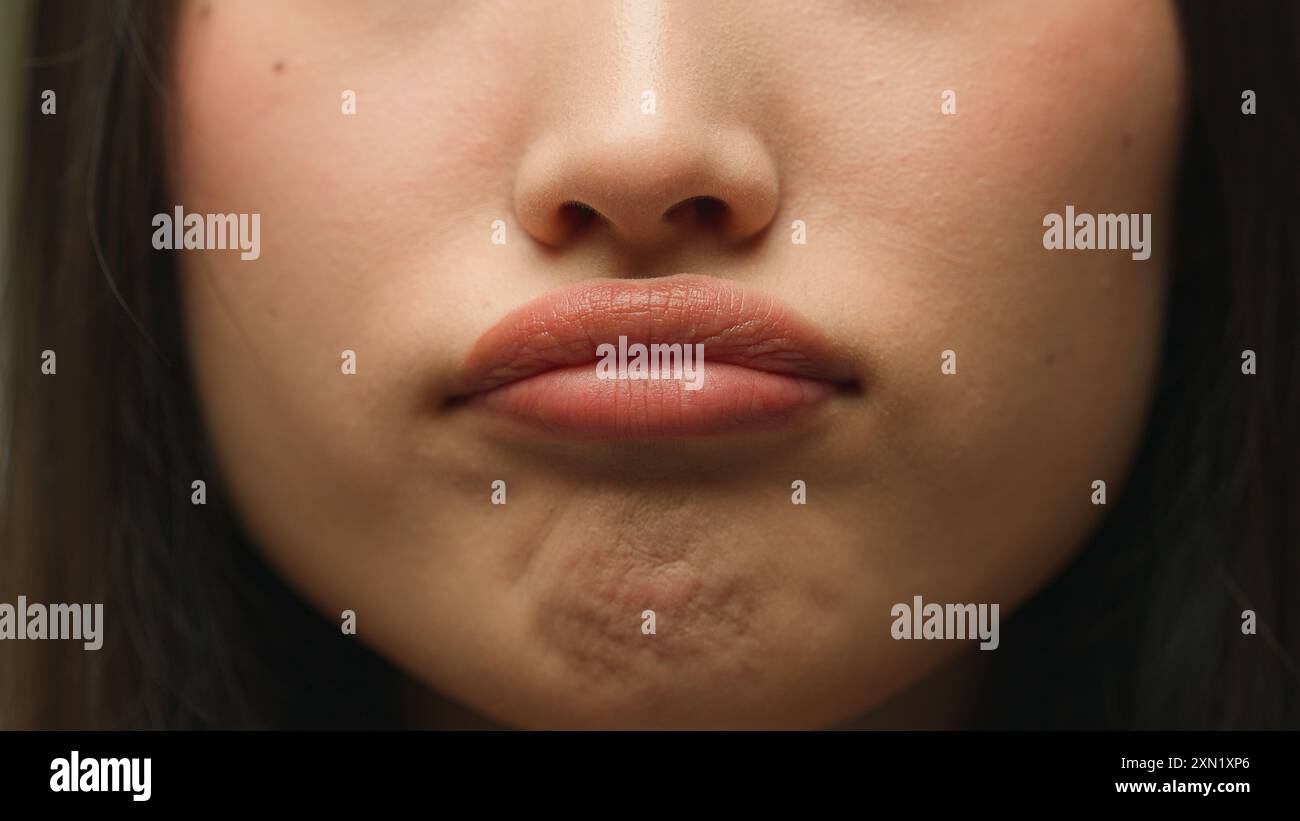 Close up female lips mouth Asian chinese woman upset displeased korean ...