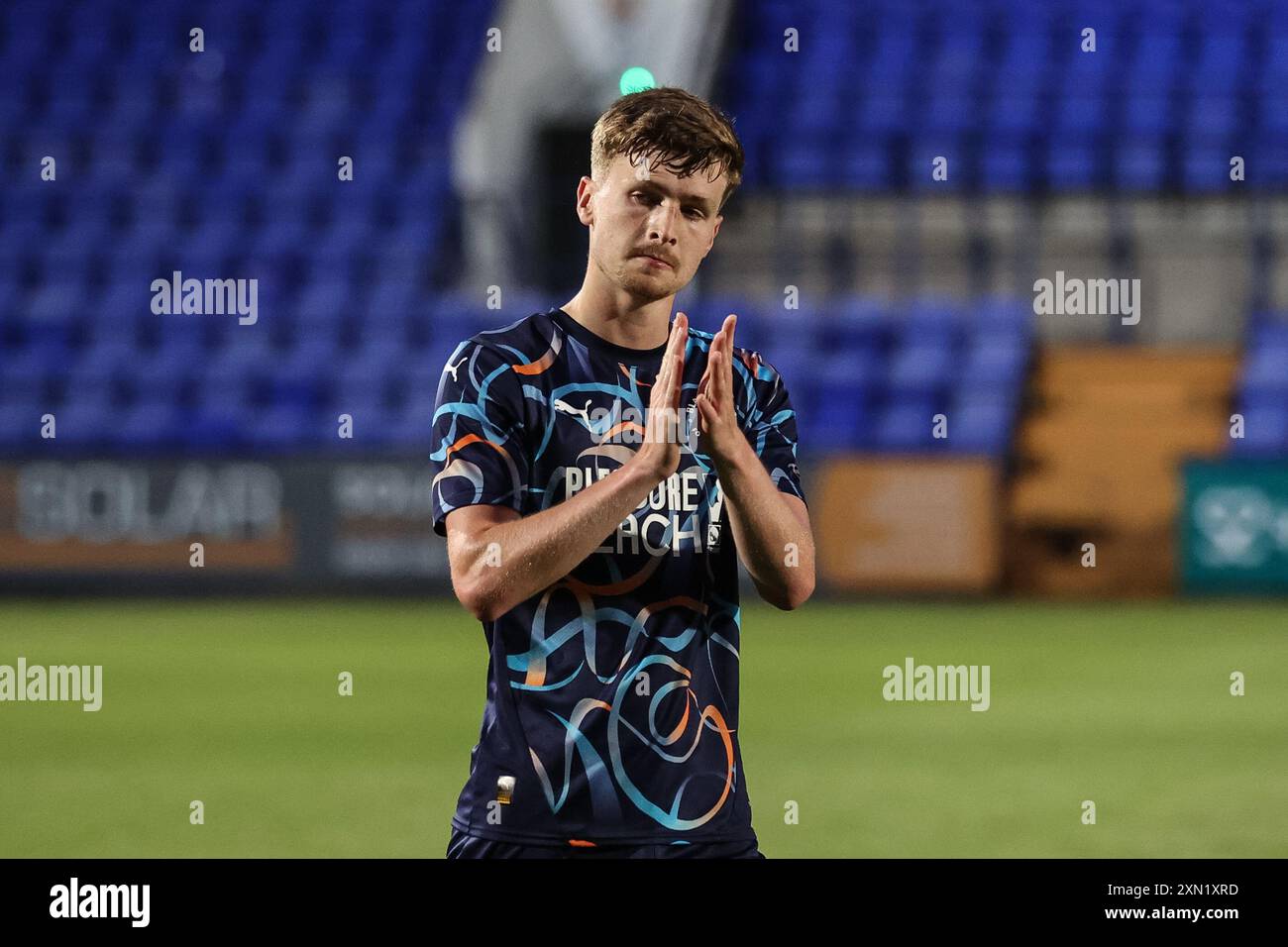 Zac Ashworth of Blackpool applauds the traveling fans during the Pre ...