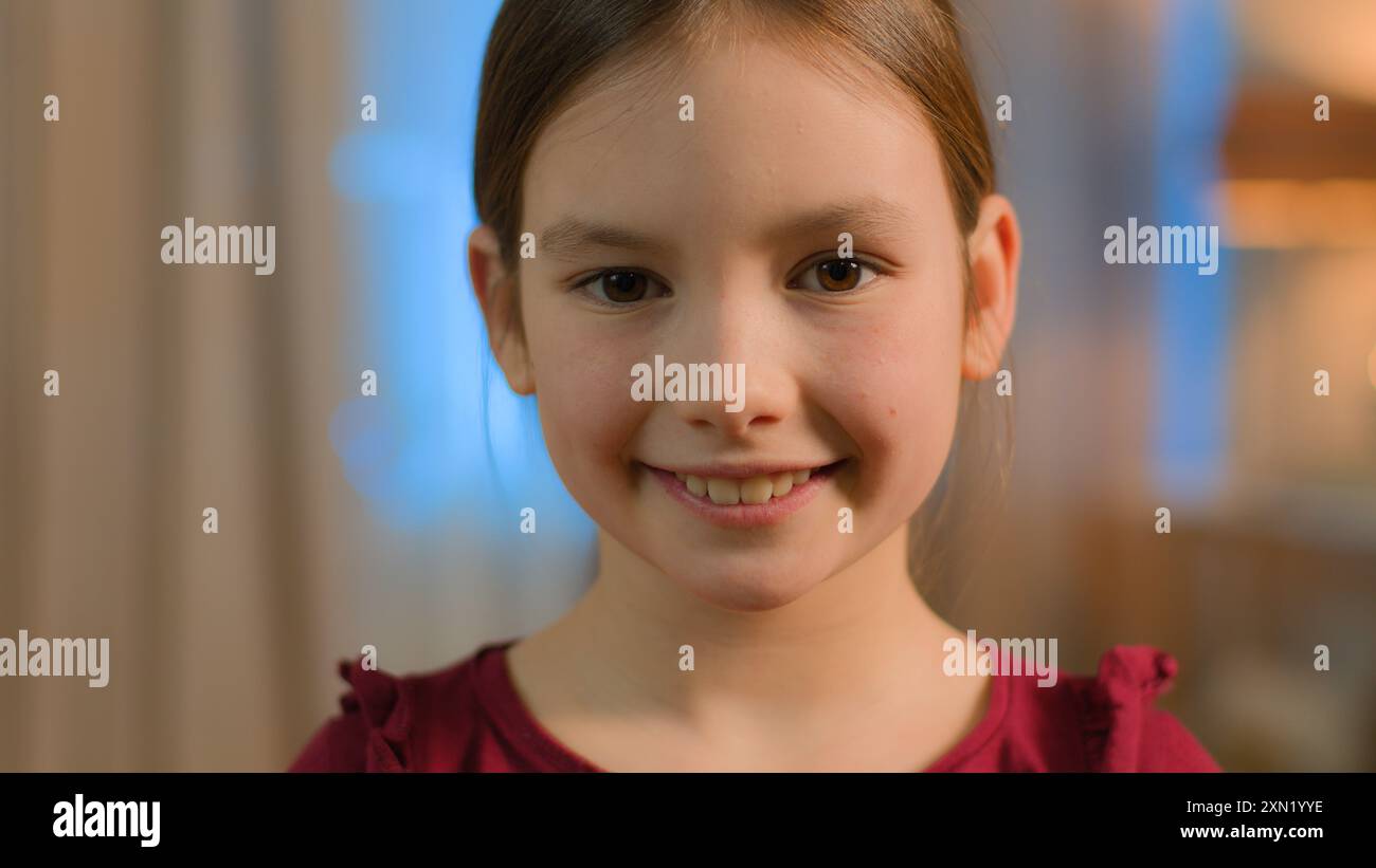 Close up portrait little Caucasian girl daughter child schoolgirl happy ...