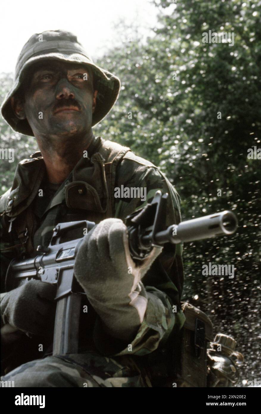 A USAF Combat Control Team member with a GAU-5A/A carbine and flash ...