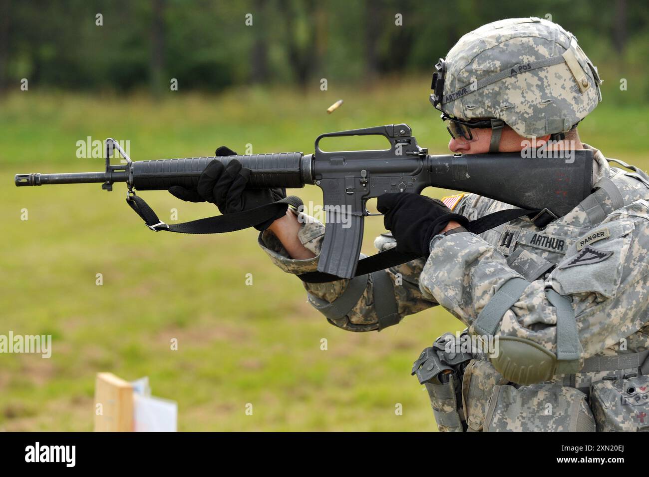 U.S. Army soldier fires his M16 rifle at the stress shoot lane during ...