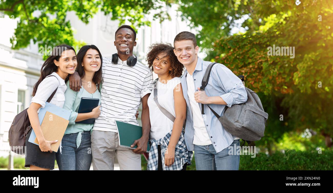 Group of international students posing in front of university Stock ...