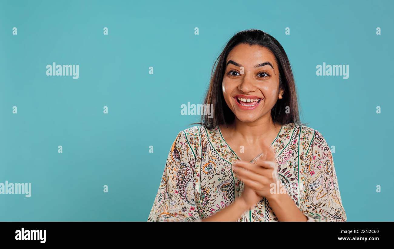 Excited woman clapping hands over hi-res stock photography and images ...