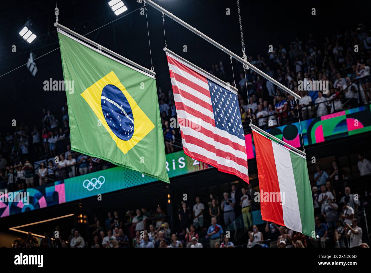 Paris, France. 30th July, 2024. Flags of medal winning teams, USA Gold ...