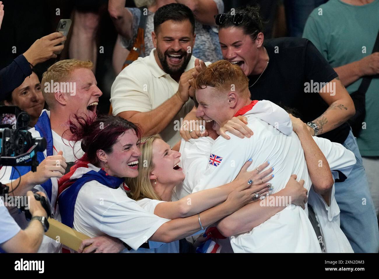 Tom Dean, a member of Britain's gold medal men's 4x200-meter freestyle ...