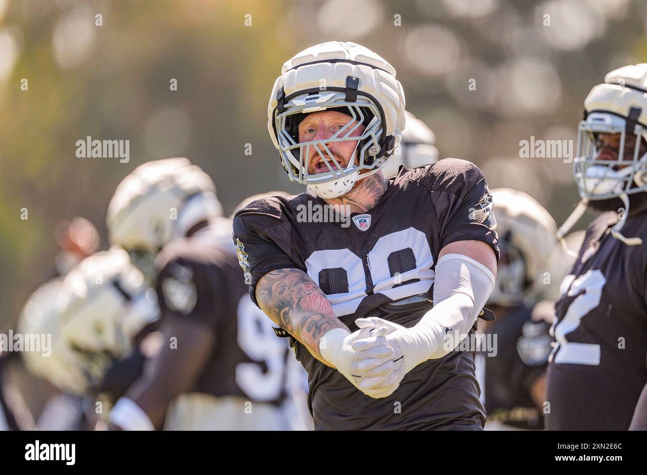 Las Vegas Raiders defensive end Maxx Crosby (98) swings to cheer ...