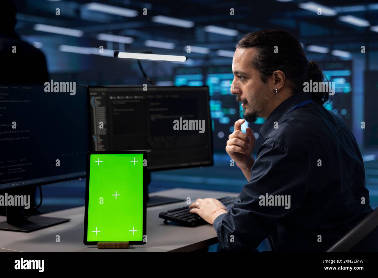 Data center programmer using mockup hi-res stock photography and images ...