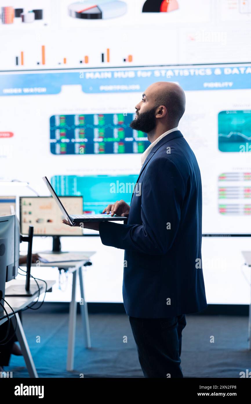 Administrative assistant examining important big data visualizations on ...