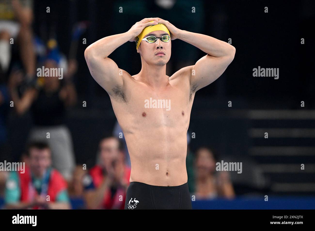 Paris, France. 30th July, 2024. Australian swimmer William Yang looks on before the Men's 100m ...