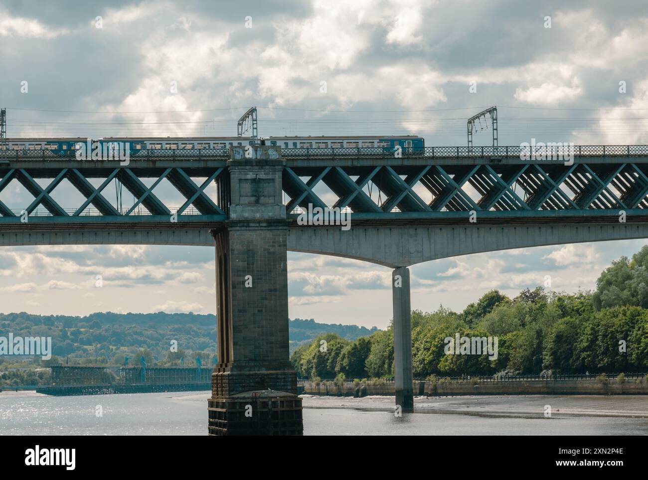 Train crossing a bridge in Newcastle upon Tyne Stock Photo - Alamy