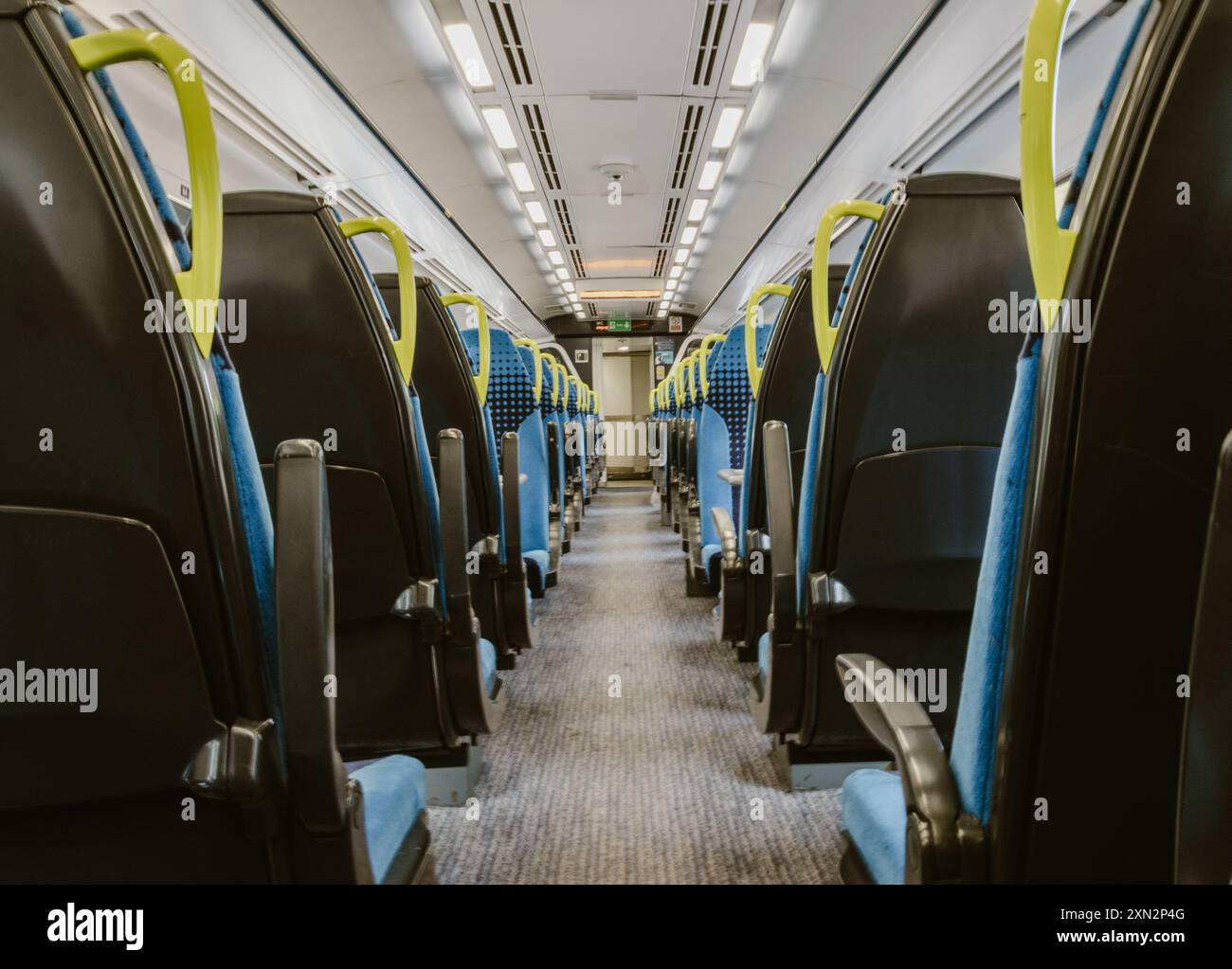 View down a train aisle Stock Photo - Alamy