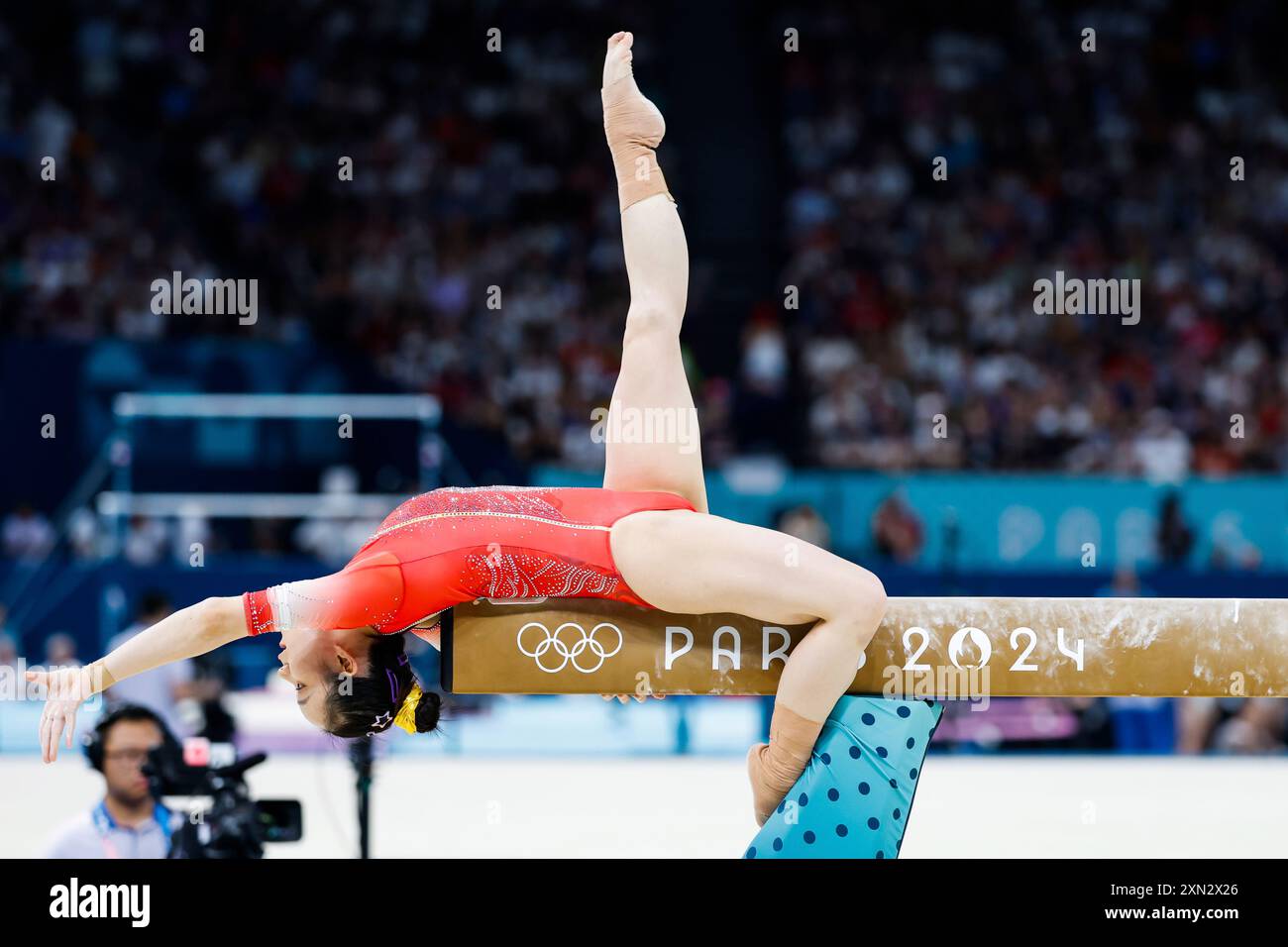 Huan Luo of China competes on Balance Beam during Women's Team Final of ...
