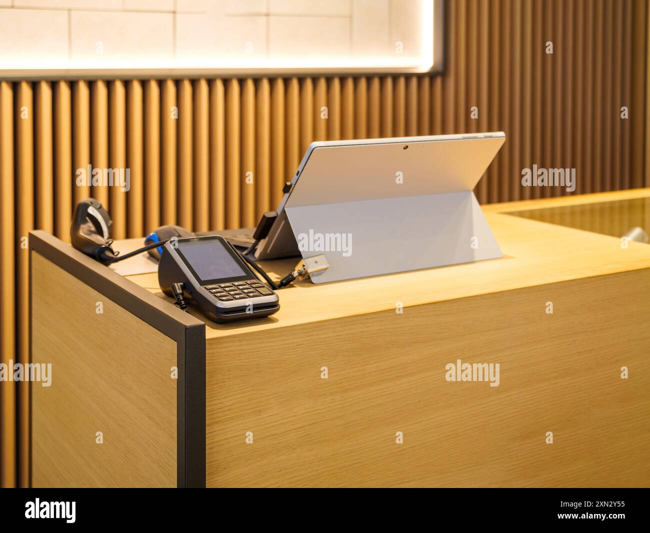 Store counter featuring a luxury setup with a smart tablet display and ...
