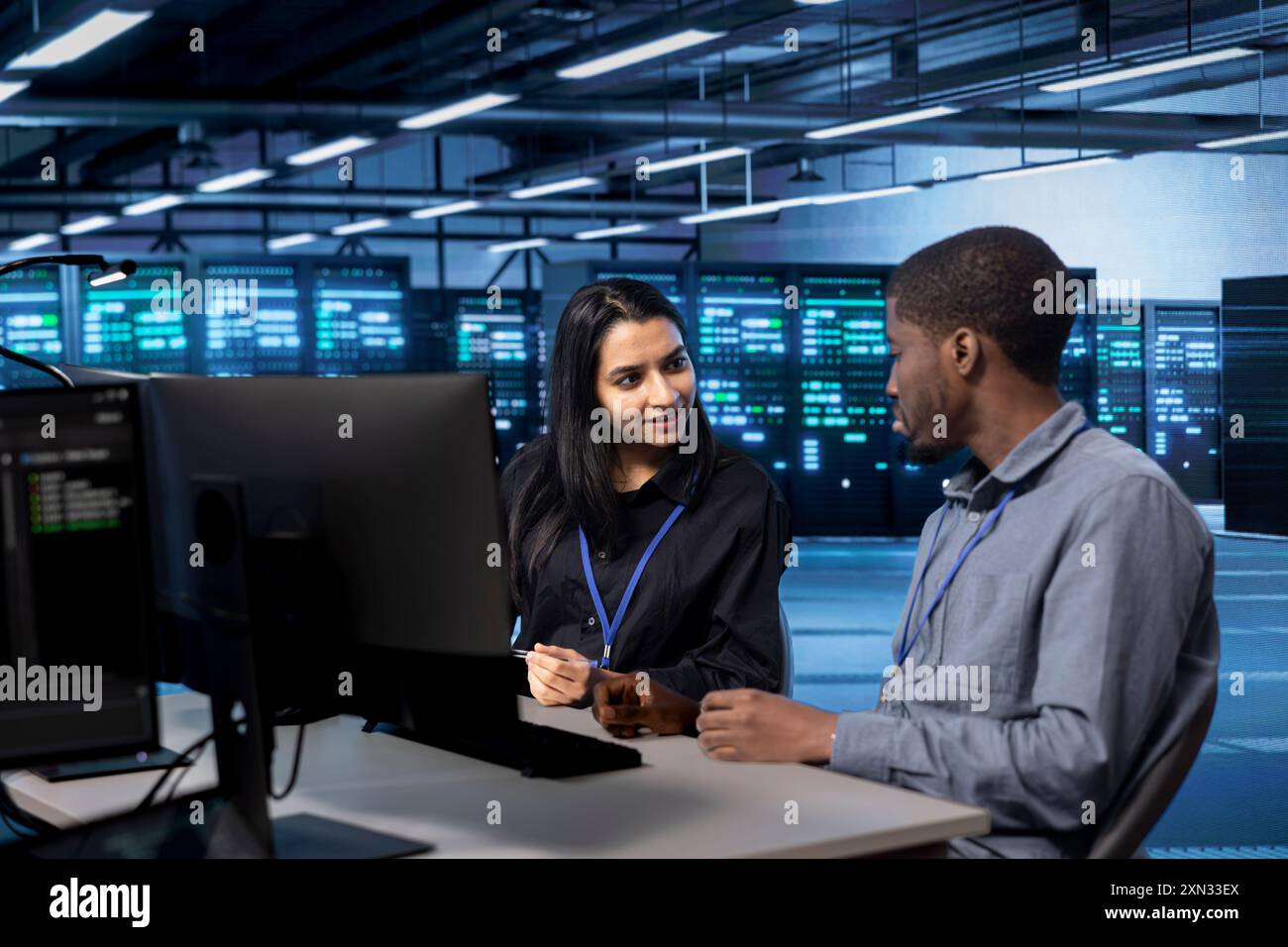 It Staff Members Using Desktop Pc To Do Maintenance In Data Center To Extend Equipment Life Span