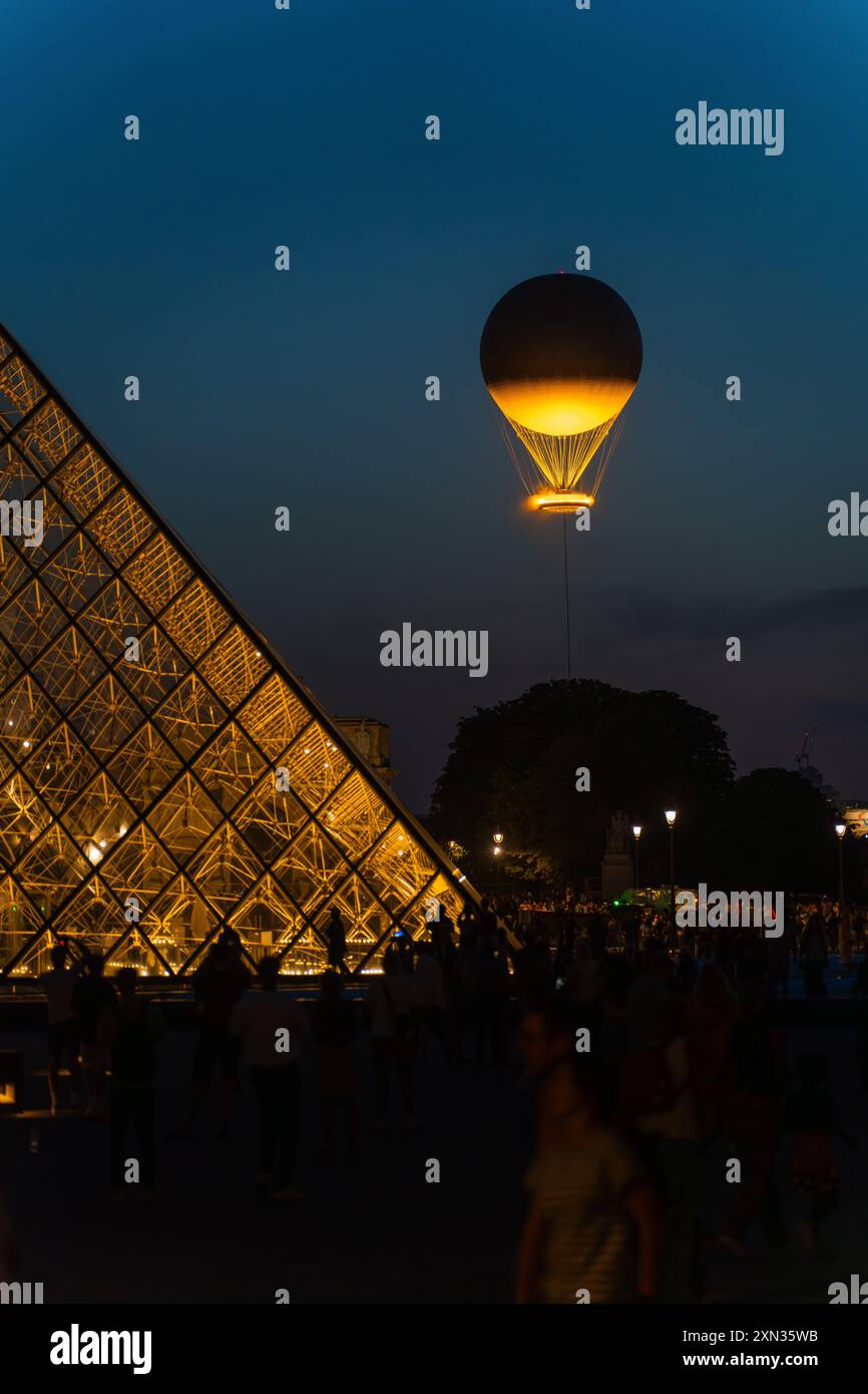 Paris, France - July 29, 2024: People take phot of Olympic Flame Hot ...