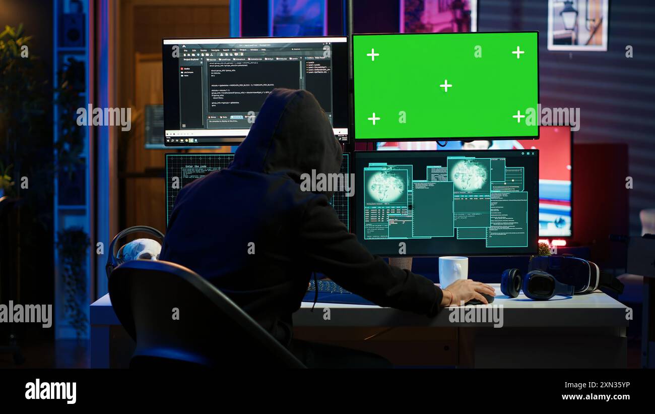 Spy using green screen PC in secret hideout to steal valuable data by ...