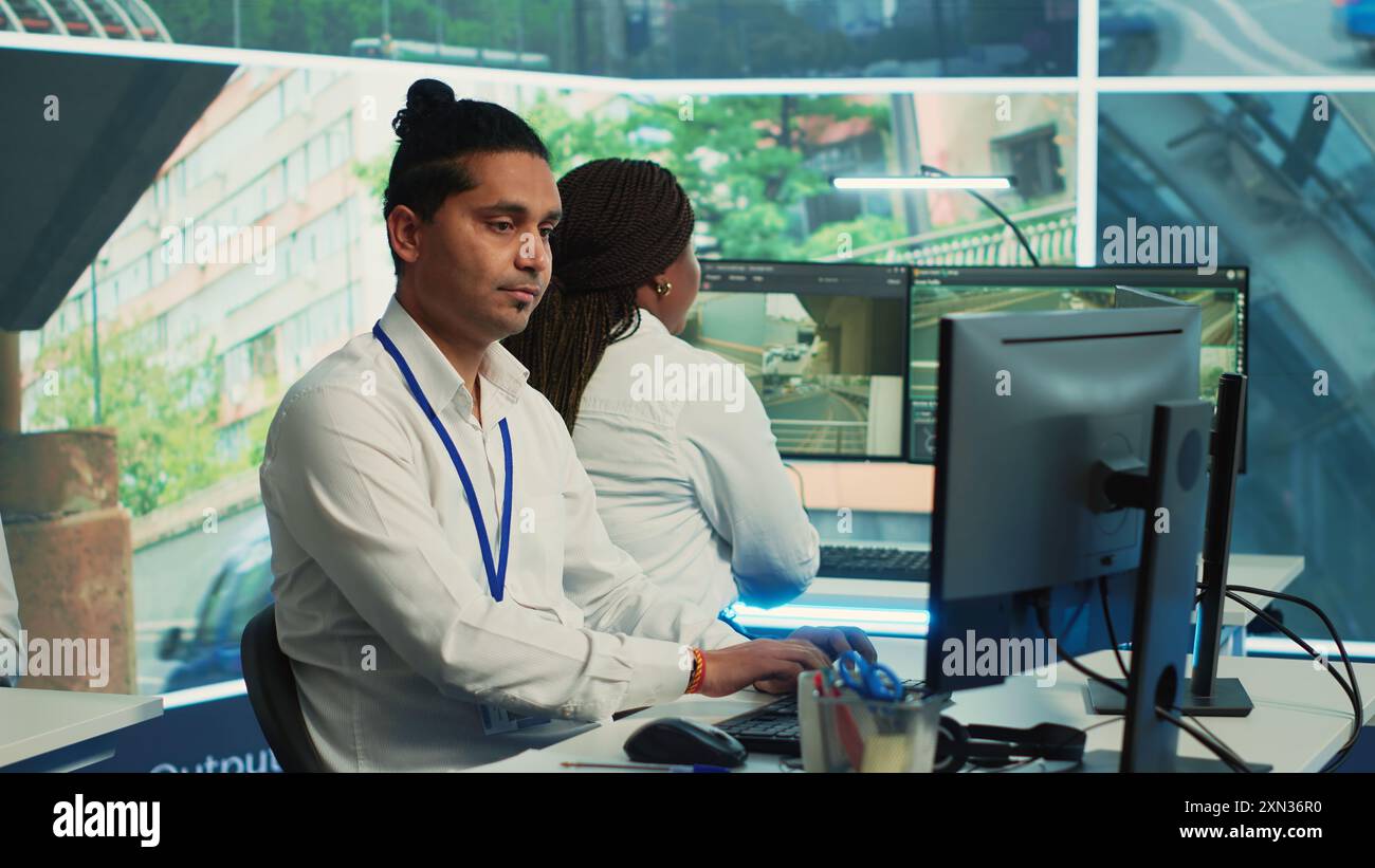 Indian worker operating on license plate registration via CCTV radar ...