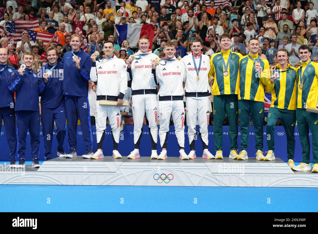 Paris, France. 30th July, 2024. Gold medalists team Britain (in white), silver medalists team ...