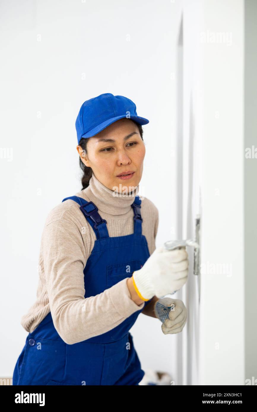 Construction worker applying plaster on hi-res stock photography and ...