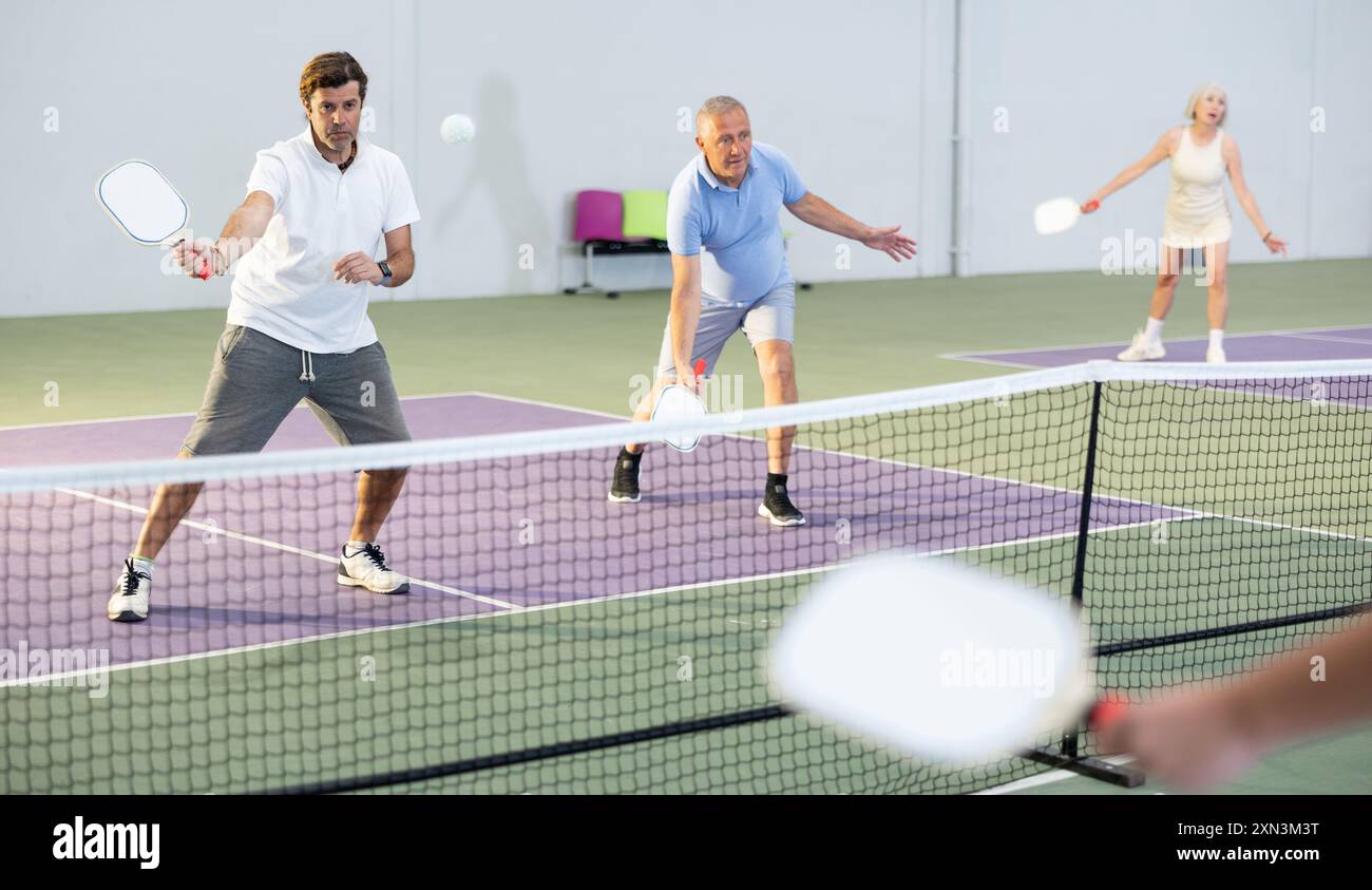 Men playing pickleball hi-res stock photography and images - Alamy