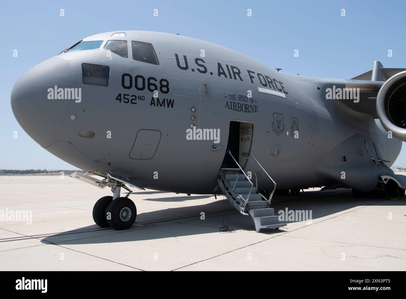 A C-17 Globemaster III is prepped to transport members of the 349th Civil Engineer Squadron at ...